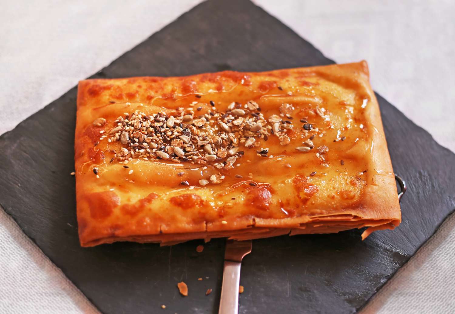 Baked filo-wrapped feta with hot honey - Rest Less