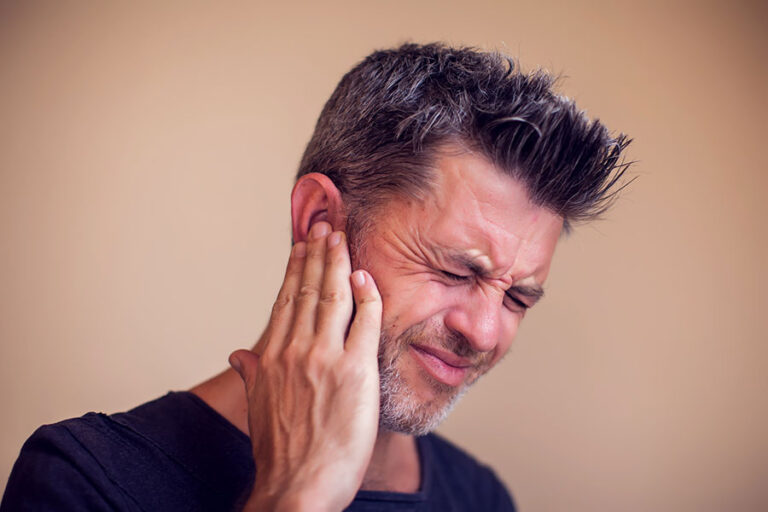 What is tinnitus? Symptoms, causes, and ways to cope - Rest Less